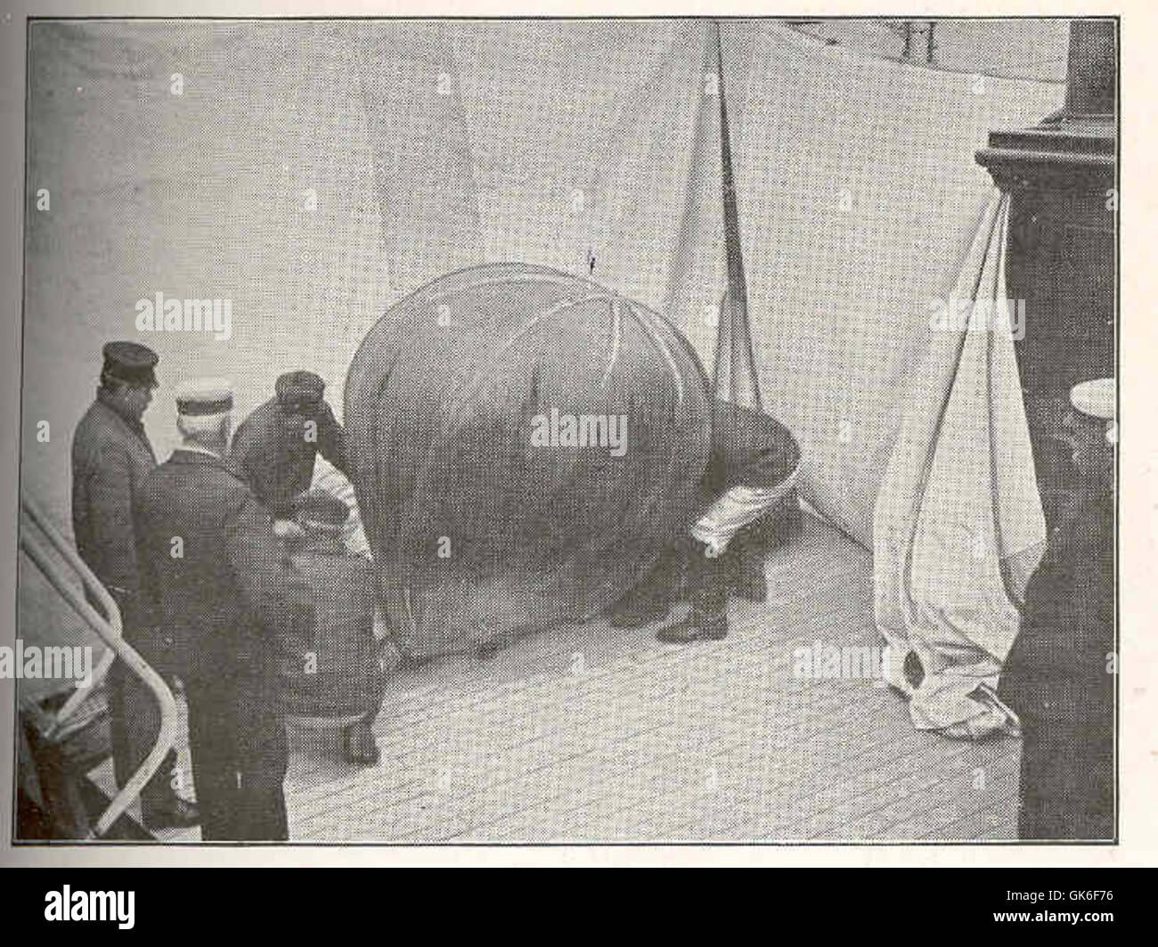 Inflation and final examination of a weather balloon before departure ...