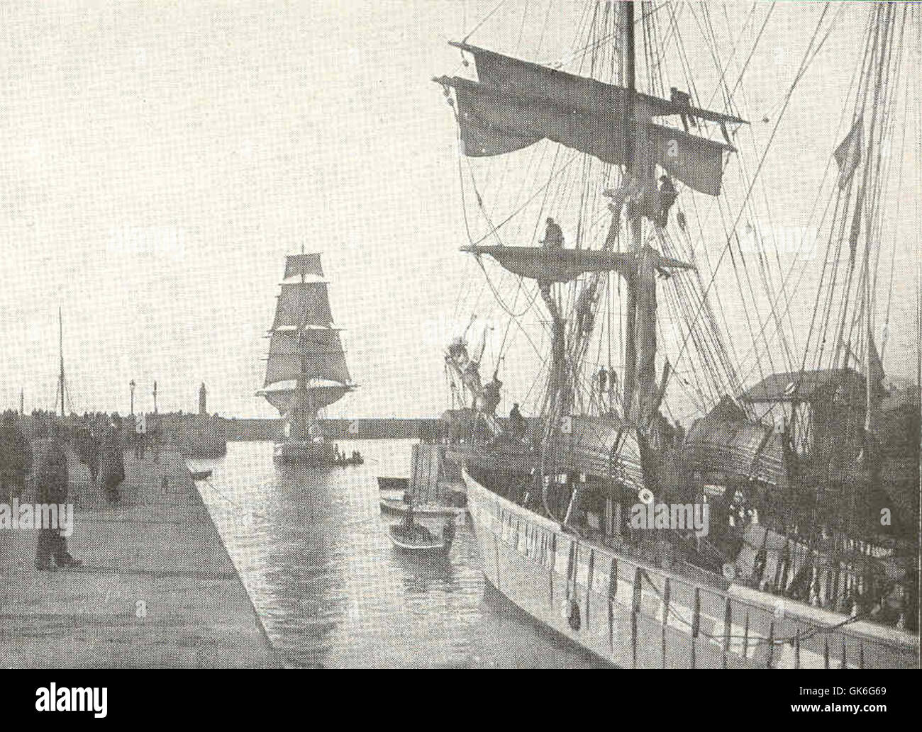 This historical scene depicts the departure of schooners (goelettes ...