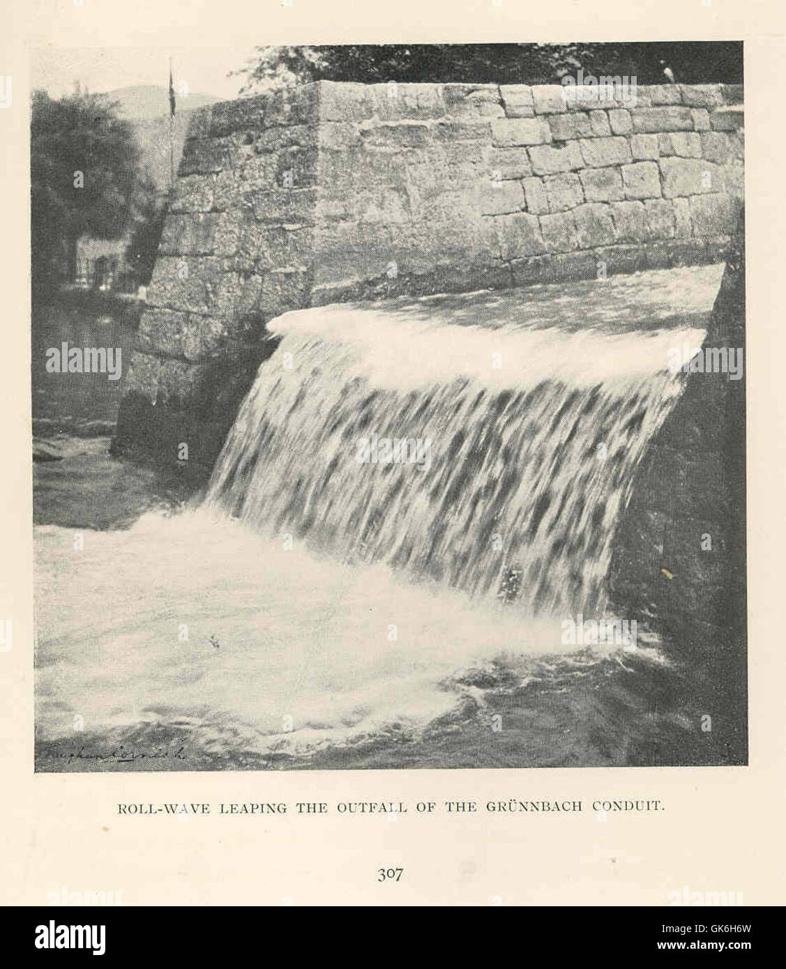 A roll-wave, a type of wave phenomenon, is seen leaping over the ...