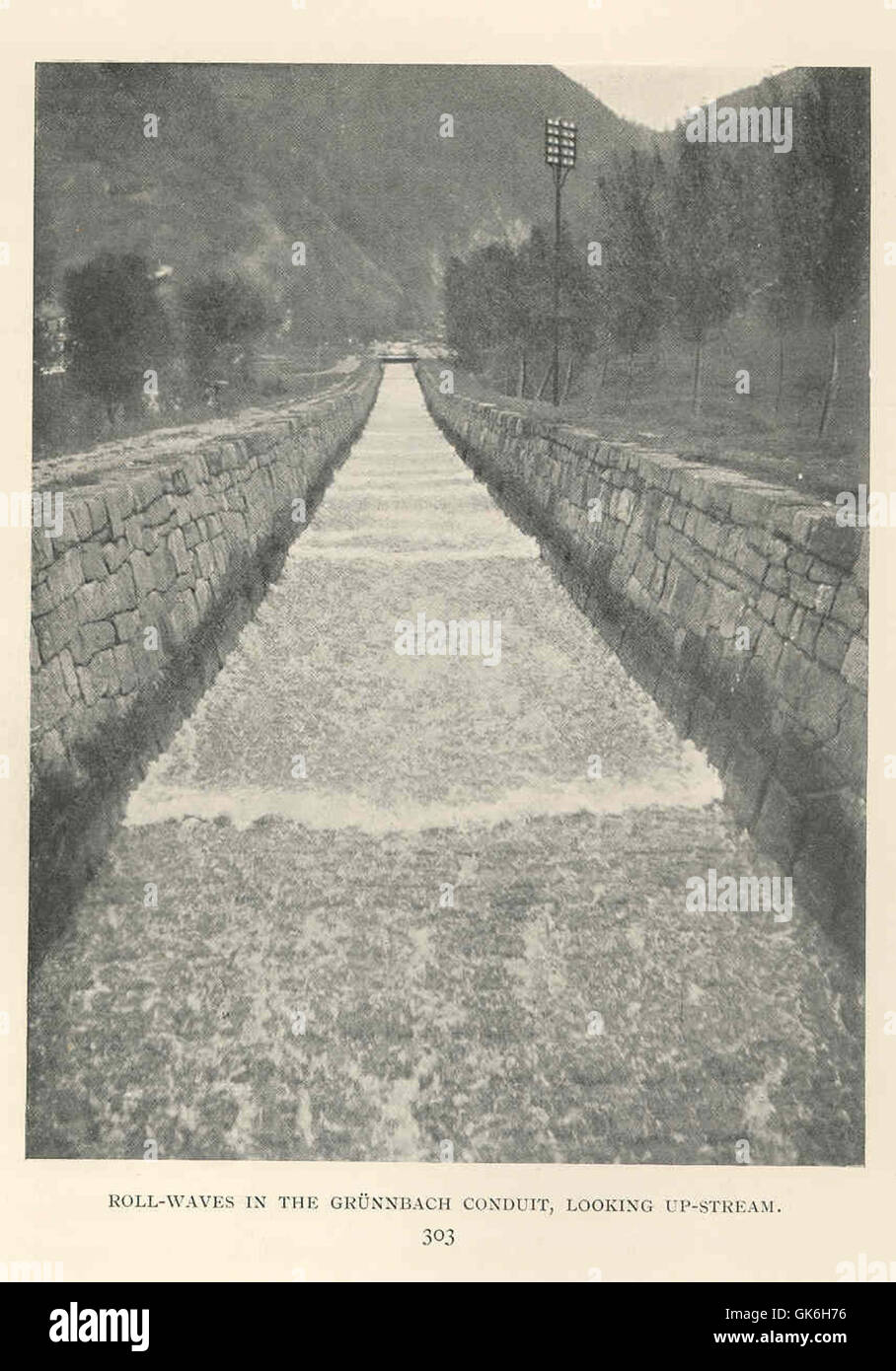 Roll-waves in the Grunnbach Conduit, viewed looking upstream, showing ...