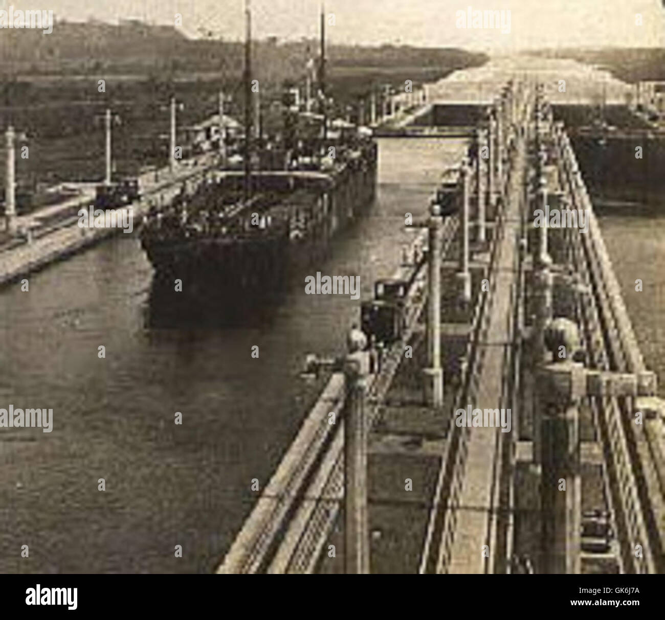 This image presents a view of double locks at a waterway, with the ...