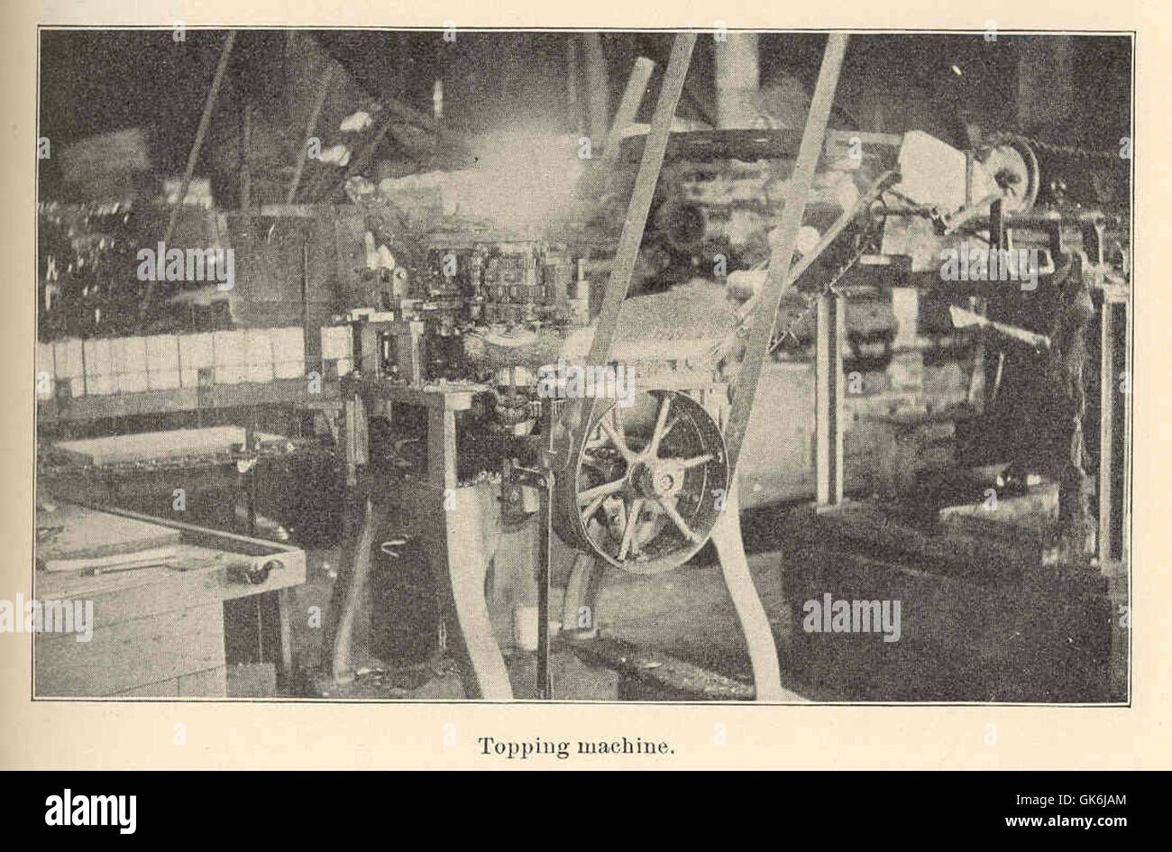 The Topping Machine is an industrial device used for applying toppings ...