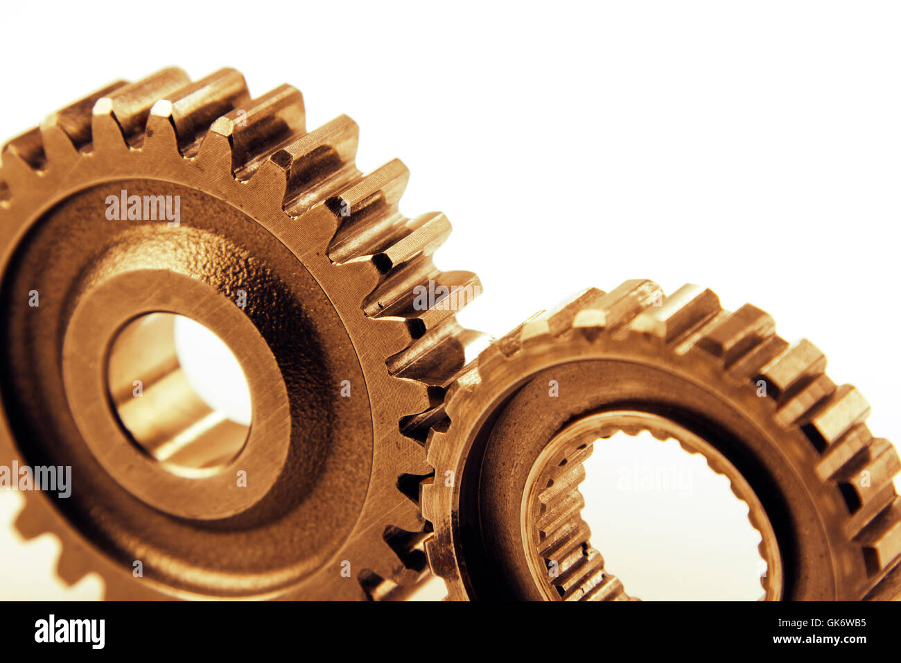 Closeup of two metal cog gears Stock Photo - Alamy