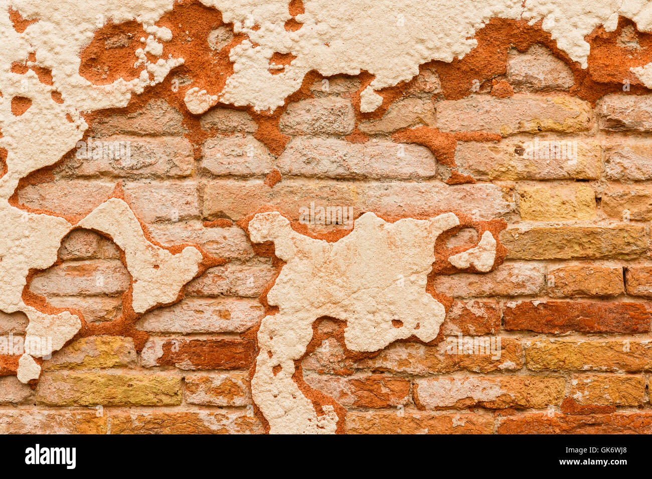 Close up of old brick wall with broken plaster Stock Photo - Alamy