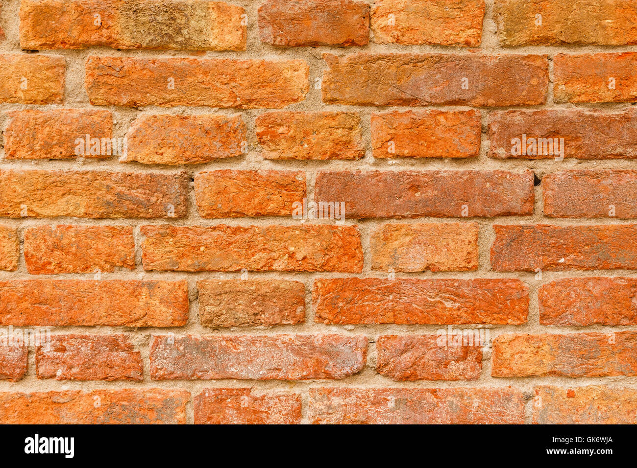 Old fashioned orange and red brick wall in Italy Europe Stock Photo - Alamy