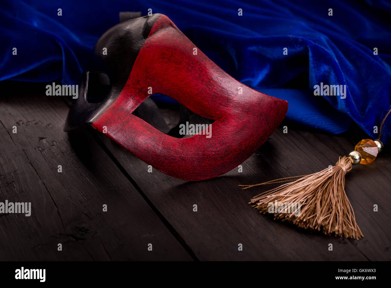 Decorated mask for masquerade and blue velvet Stock Photo - Alamy