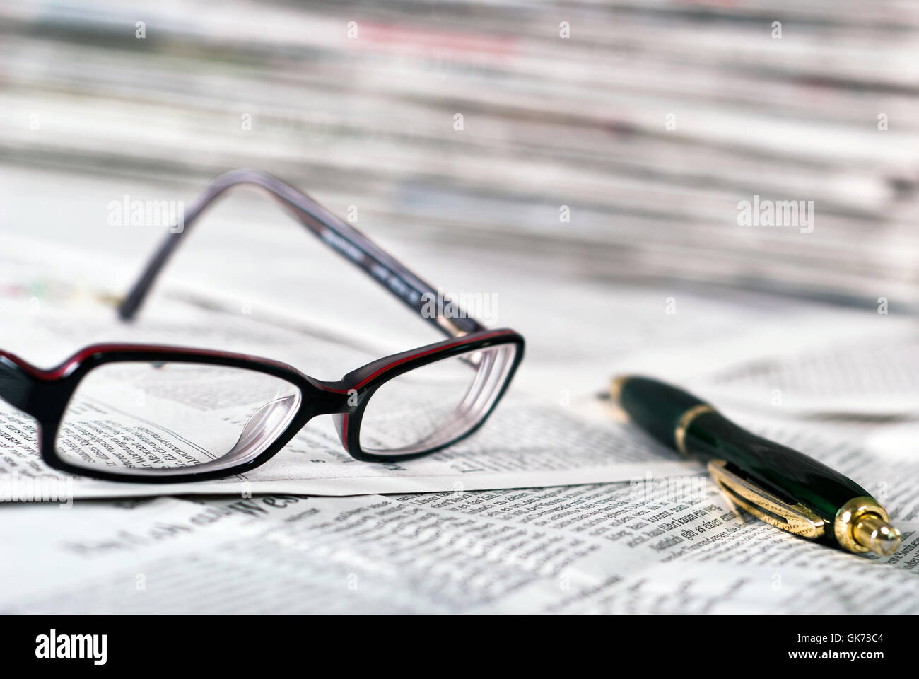 reading glasses and pen Stock Photo - Alamy