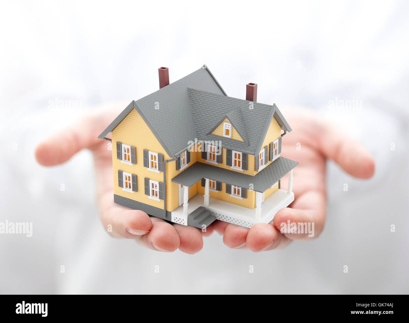 house building hand Stock Photo - Alamy