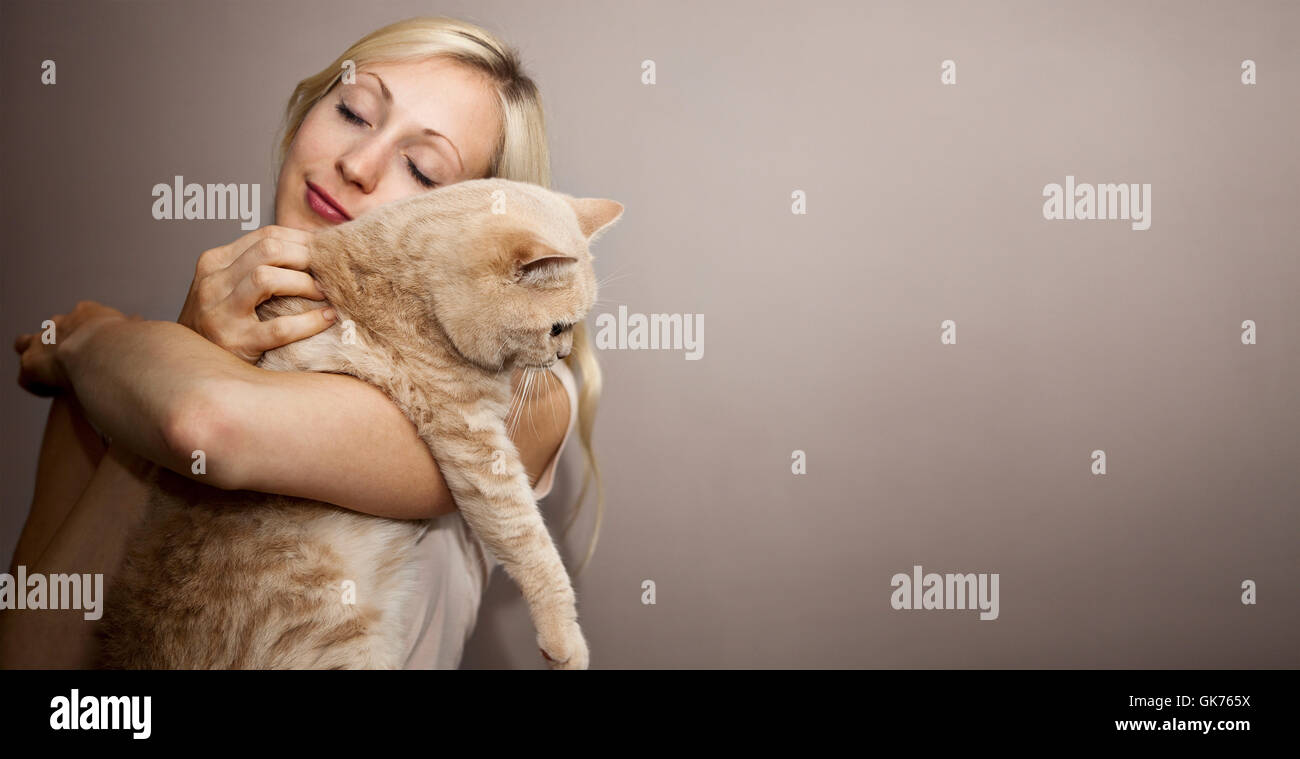 woman animals embrace Stock Photo - Alamy