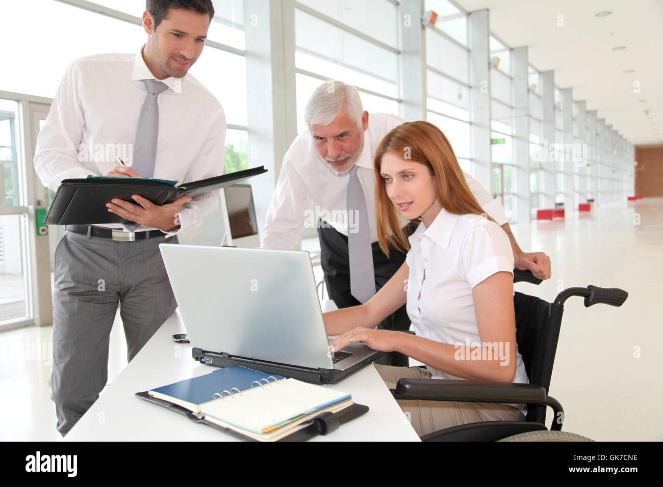 woman wheelchair office Stock Photo - Alamy