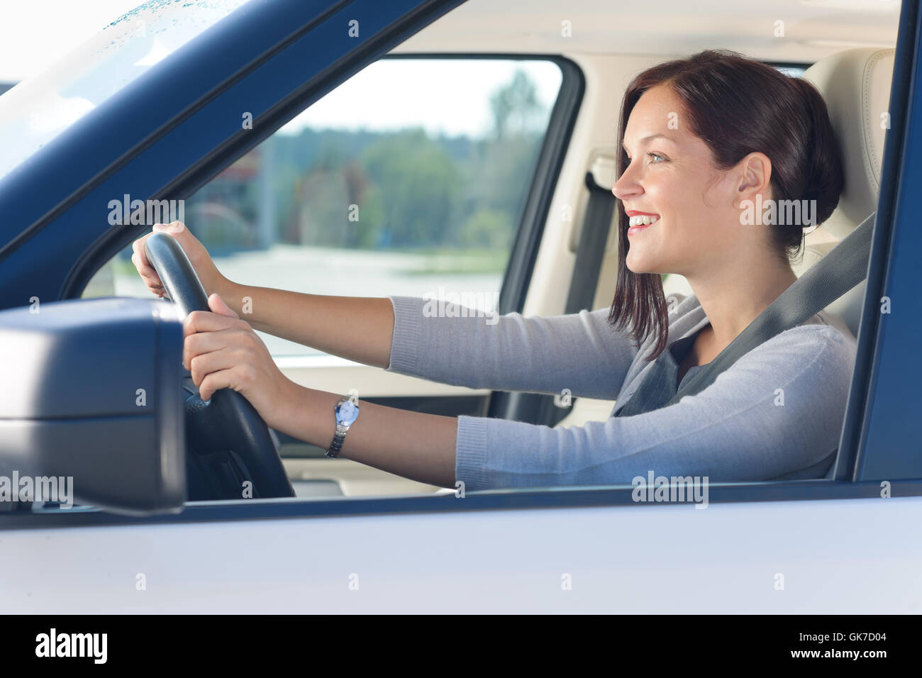 Woman car alone happy drive view hi-res stock photography and images ...
