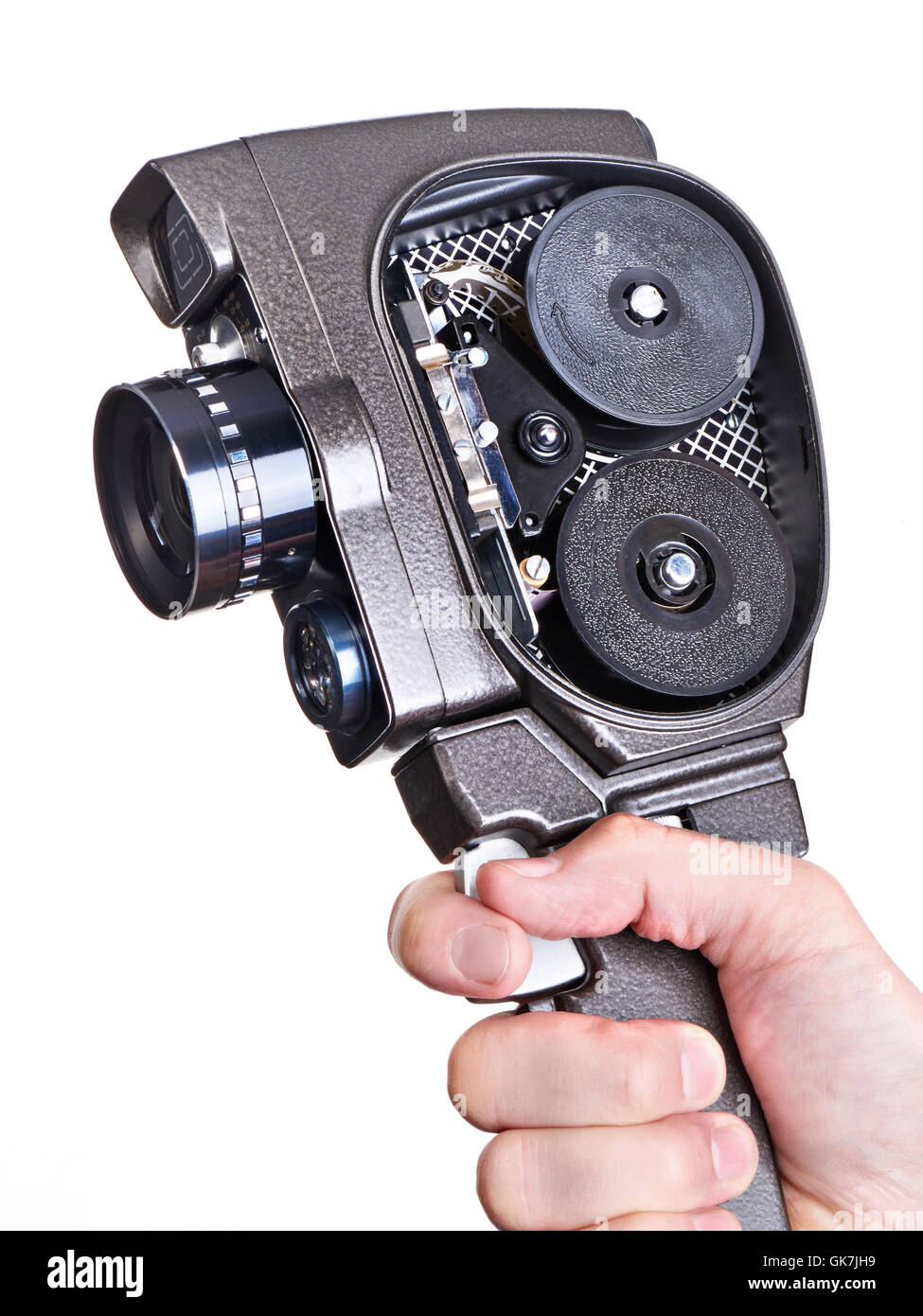 Retro mechanical hobbies movie camera in the hands of the operator with ...