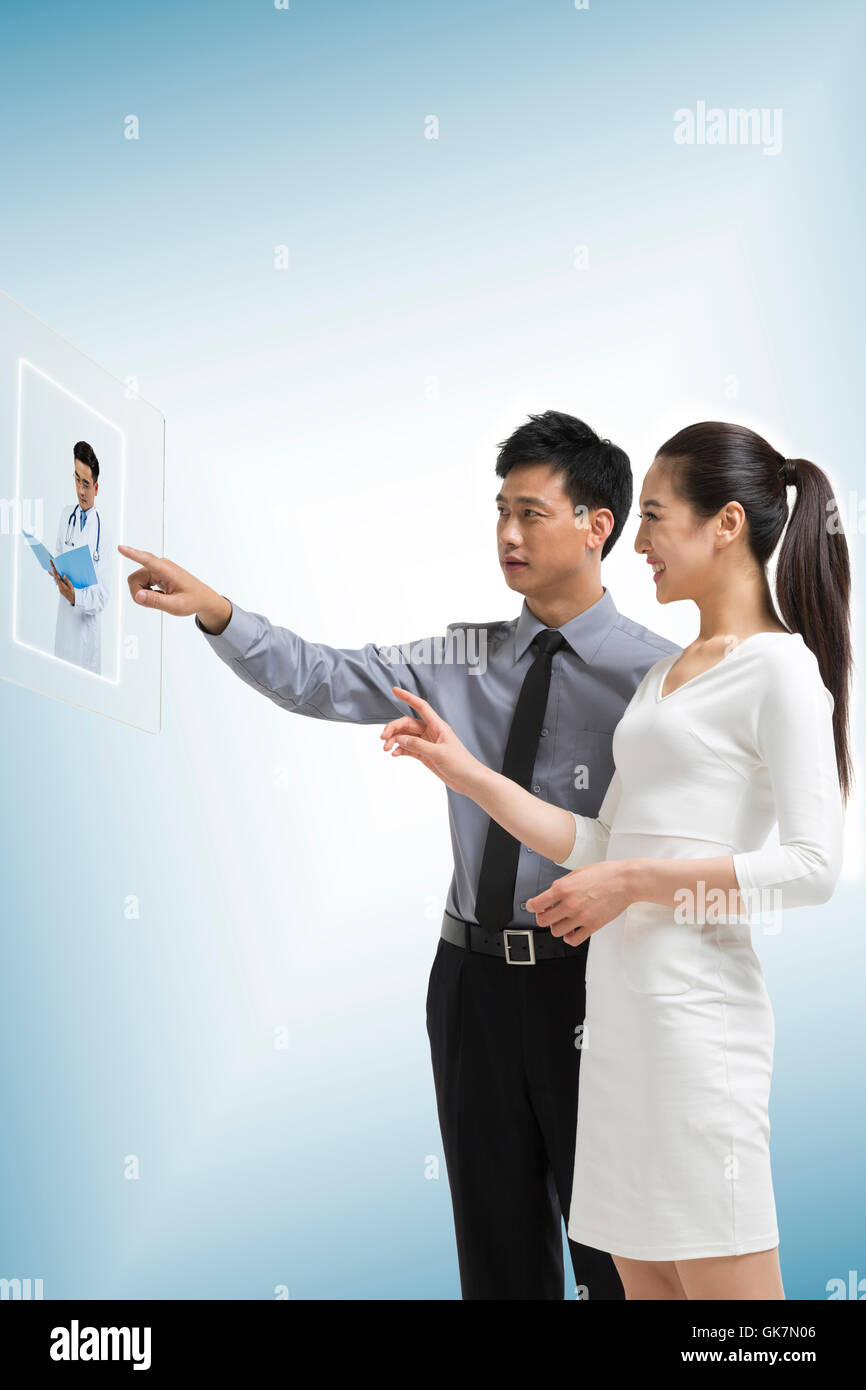 Science and Technology business people to use touch screen Stock Photo ...