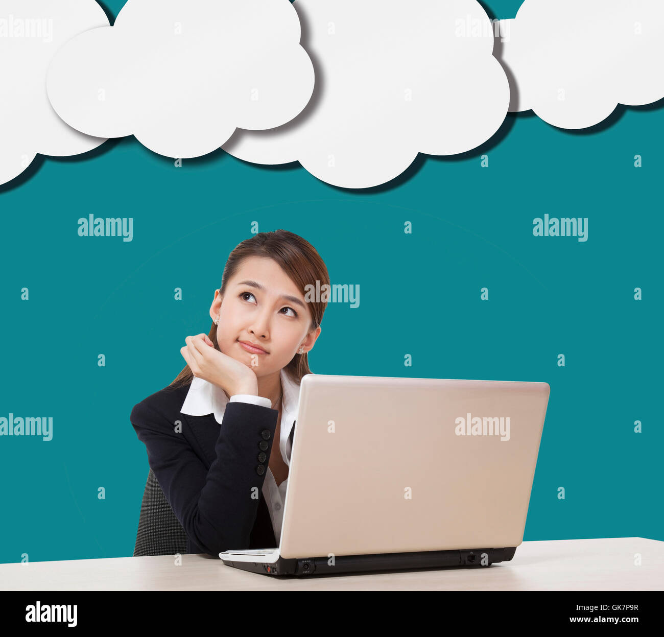 Business woman thinking Stock Photo - Alamy