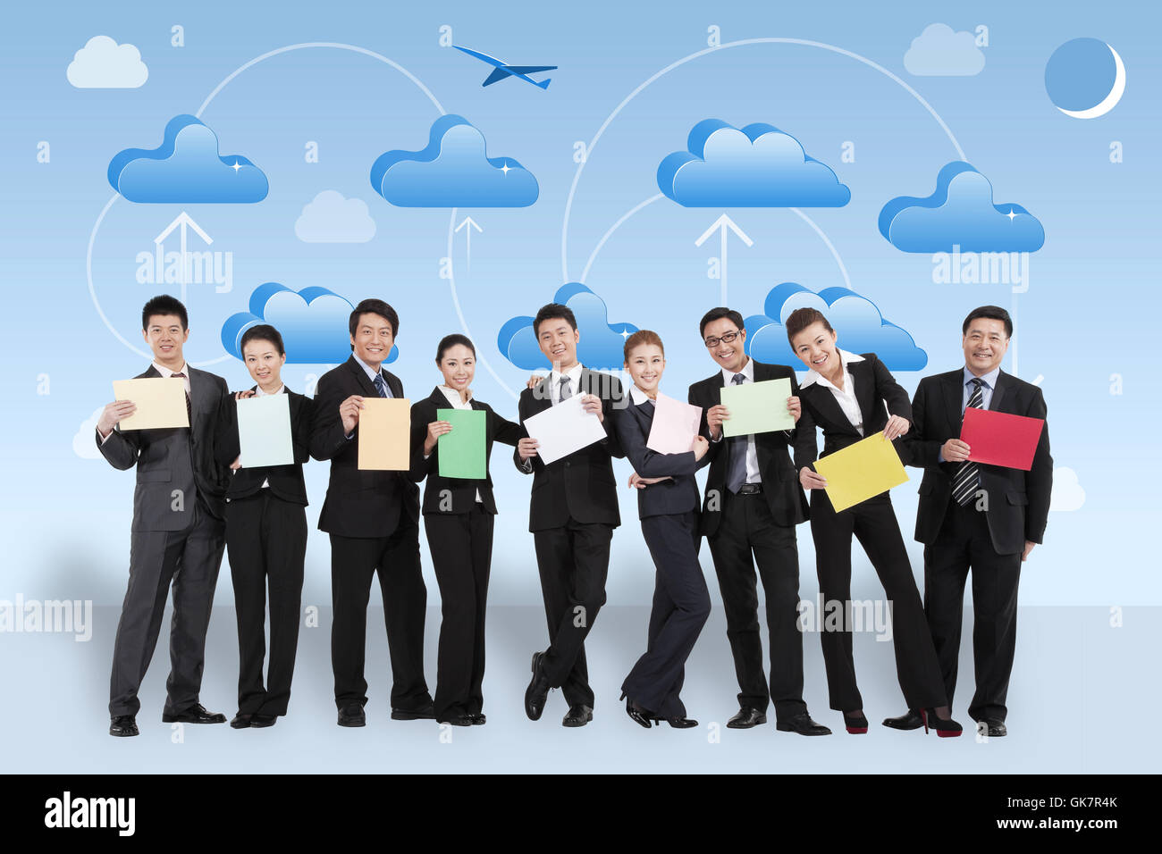 Business team holding a white board Stock Photo - Alamy