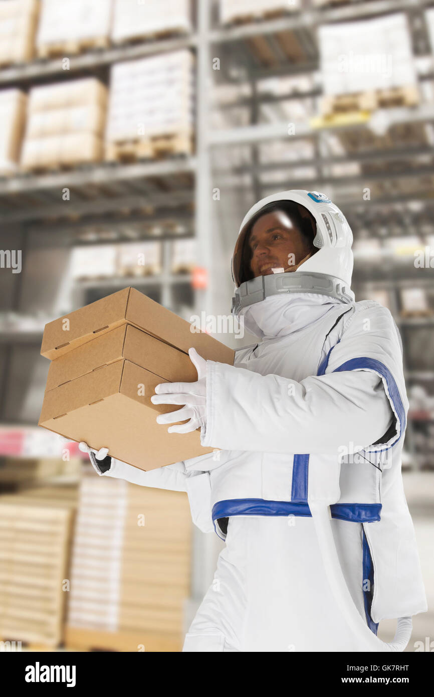 Astronaut express delivery Stock Photo - Alamy
