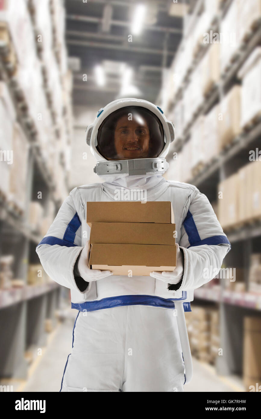 Astronaut express delivery Stock Photo - Alamy