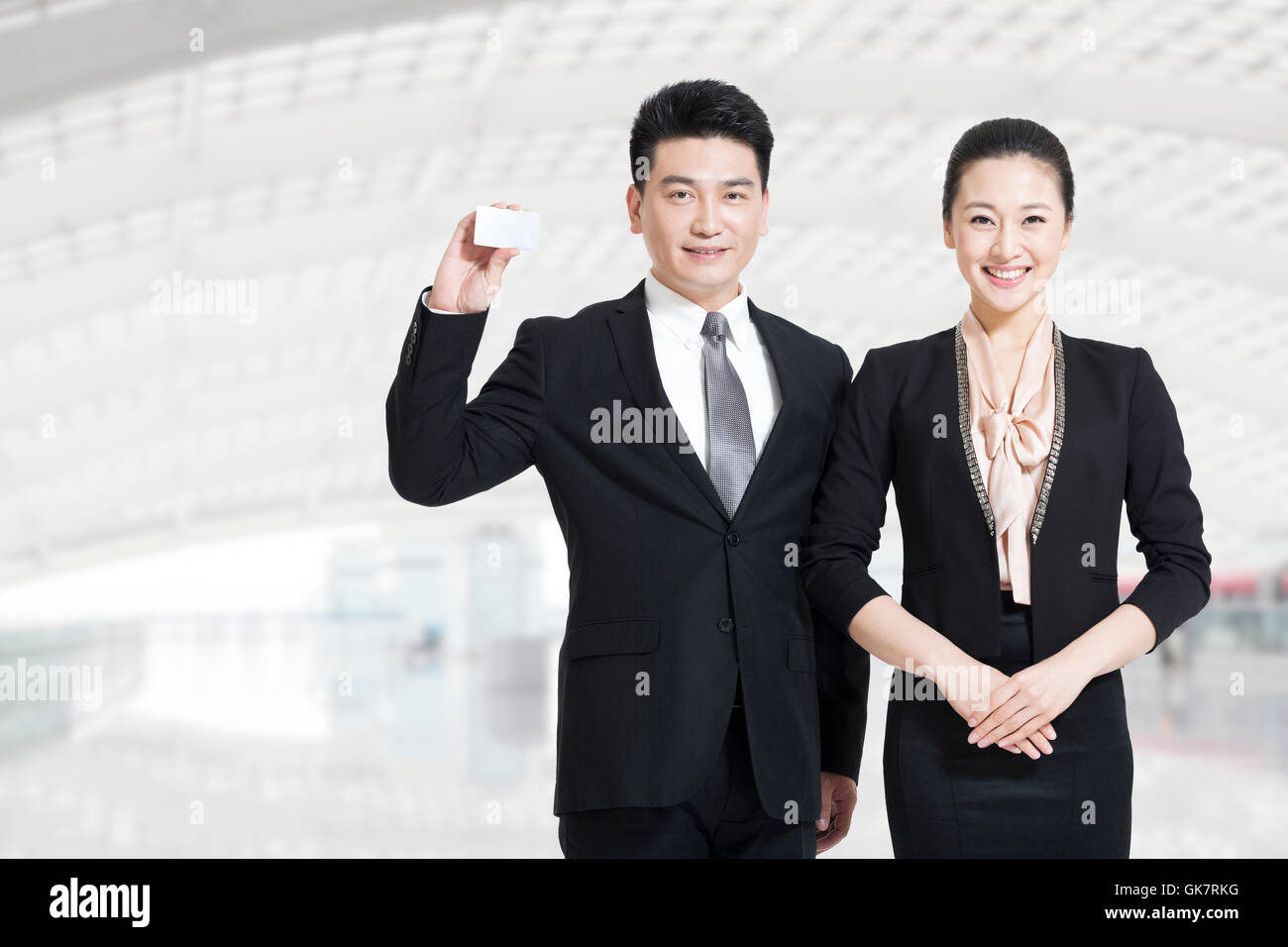 Business people showing Card Stock Photo - Alamy