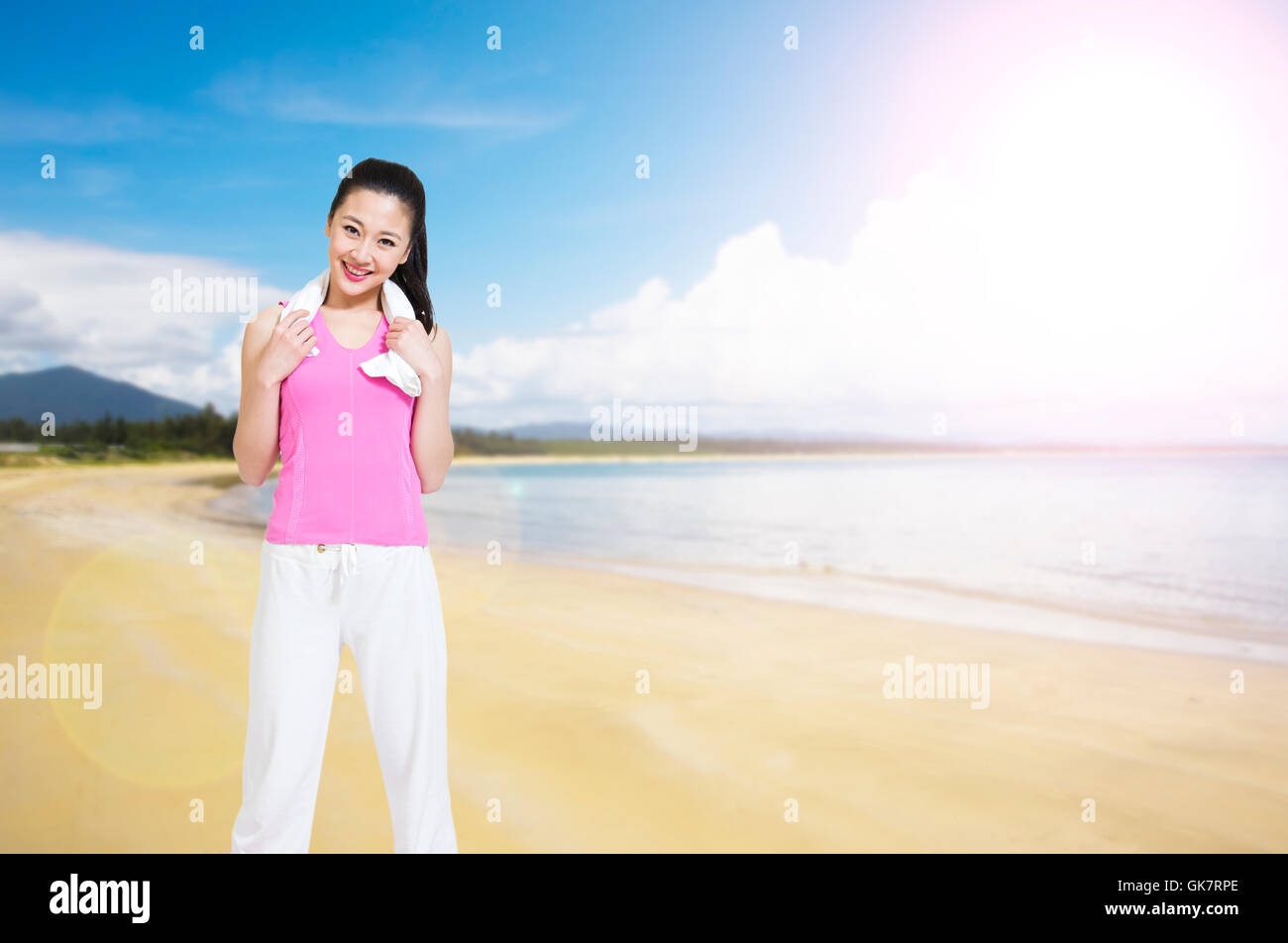 Studio shot Young woman fitness exercise Stock Photo - Alamy