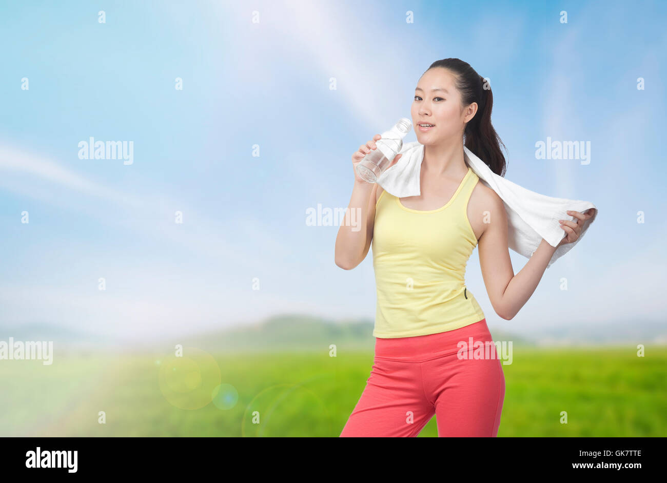 Studio shot Young woman fitness exercise Stock Photo - Alamy