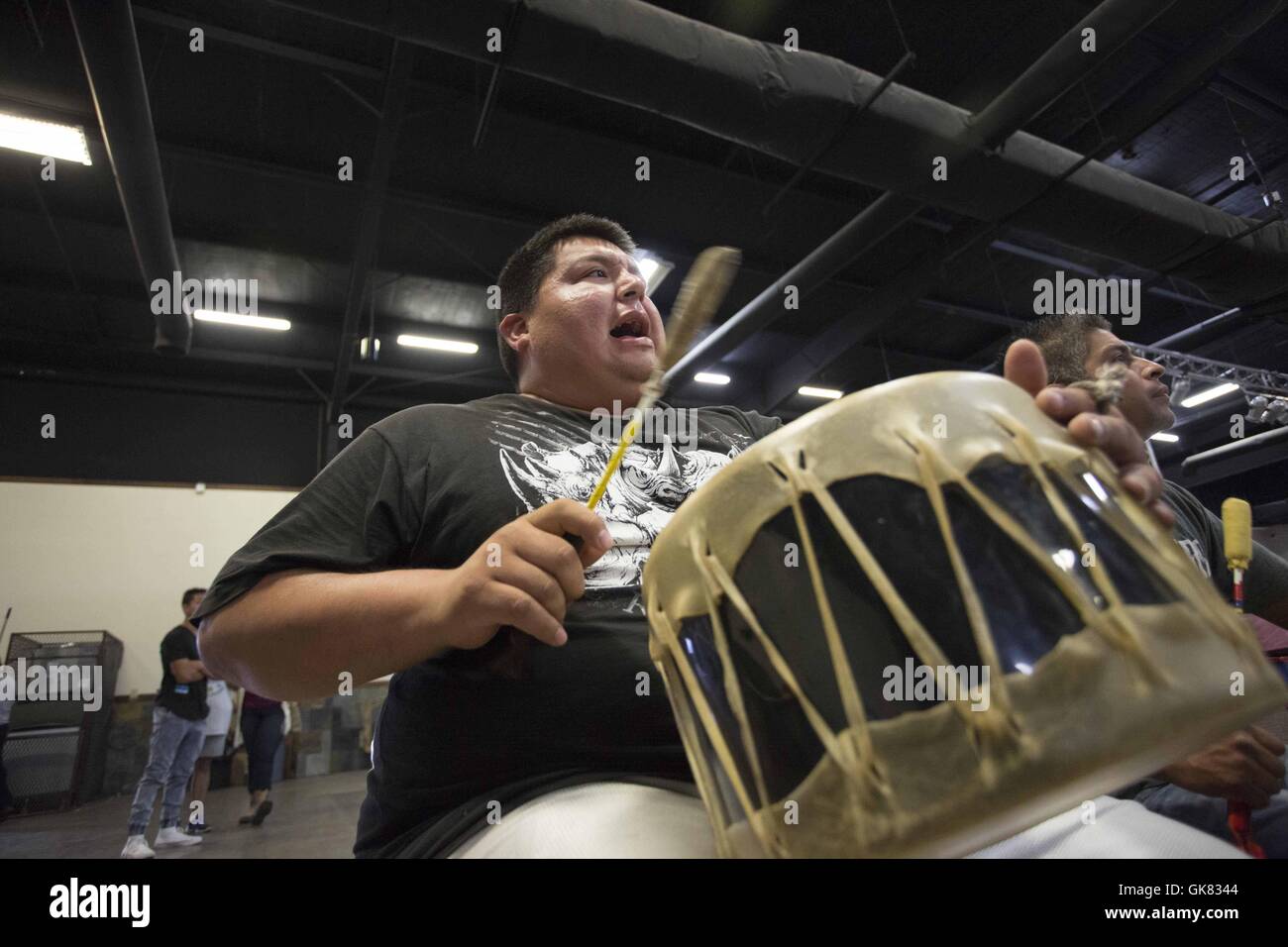 Elgin, Florida, USA. 8th Nov, 2016. A man uses a drum to distract the ...