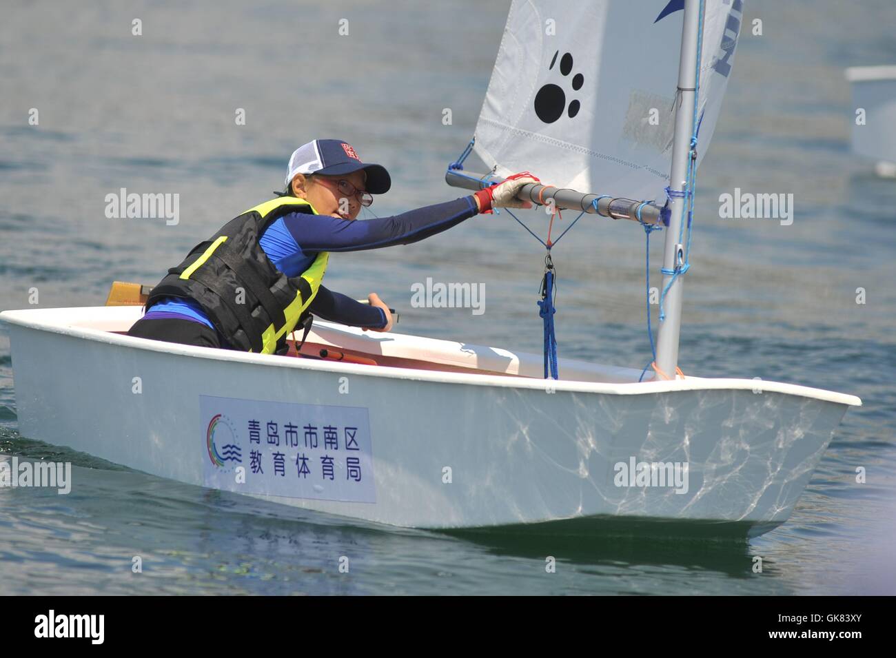 Qingdao, China's Shandong Province. 18th Aug, 2016. A girl takes part ...