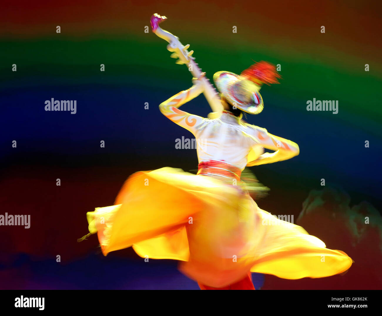 Beijing, China. 18th Aug, 2016. A performer stages folk dance of the ...