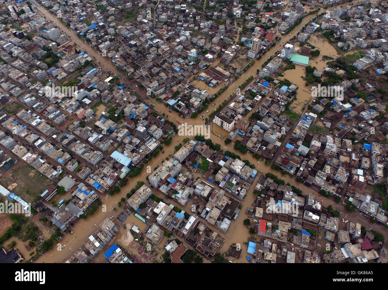 Lingao. 19th Aug, 2016. Photo taken on Aug. 19, 2016 shows waterlogged ...