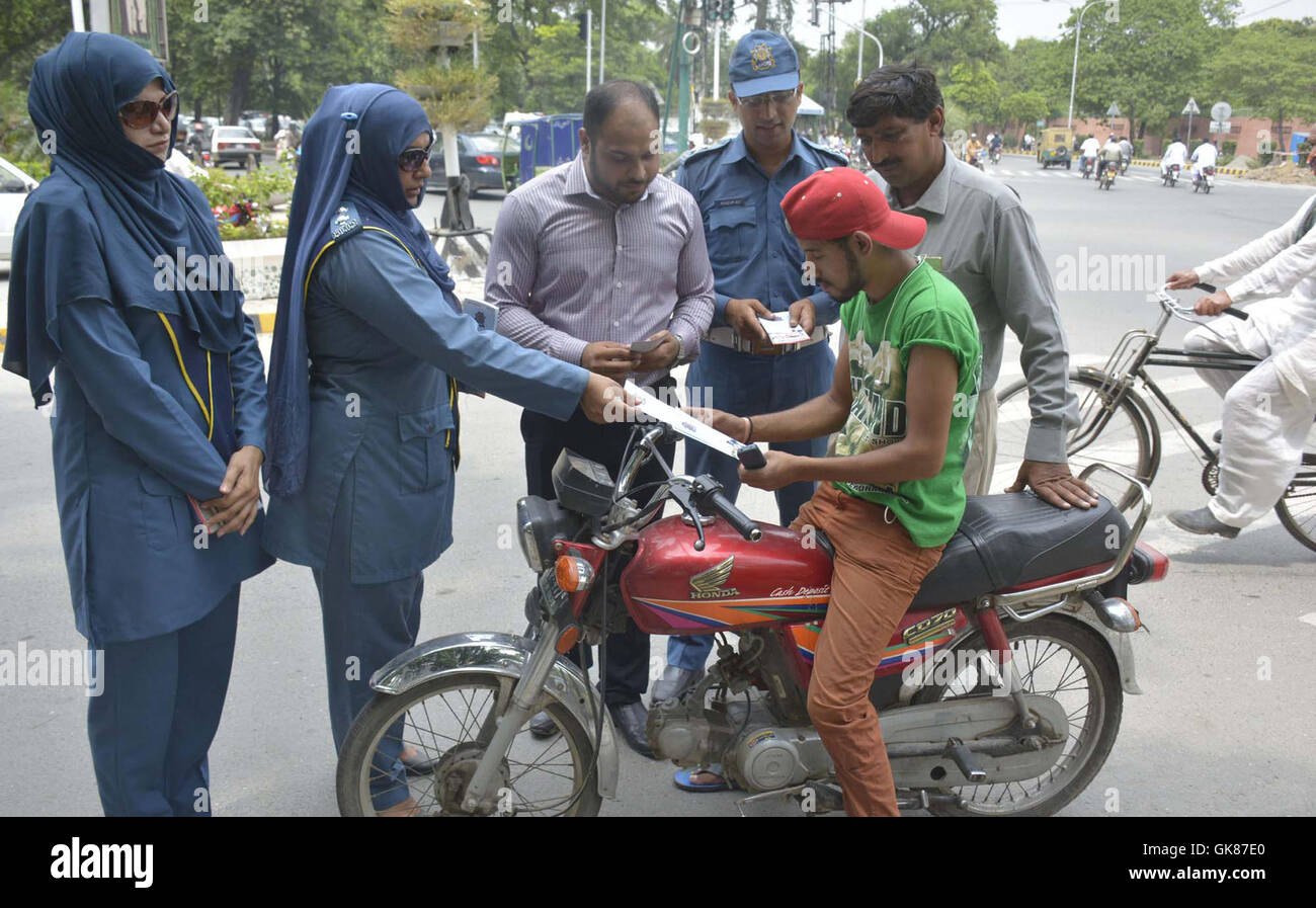 Distributing pamphlets hi-res stock photography and images - Alamy