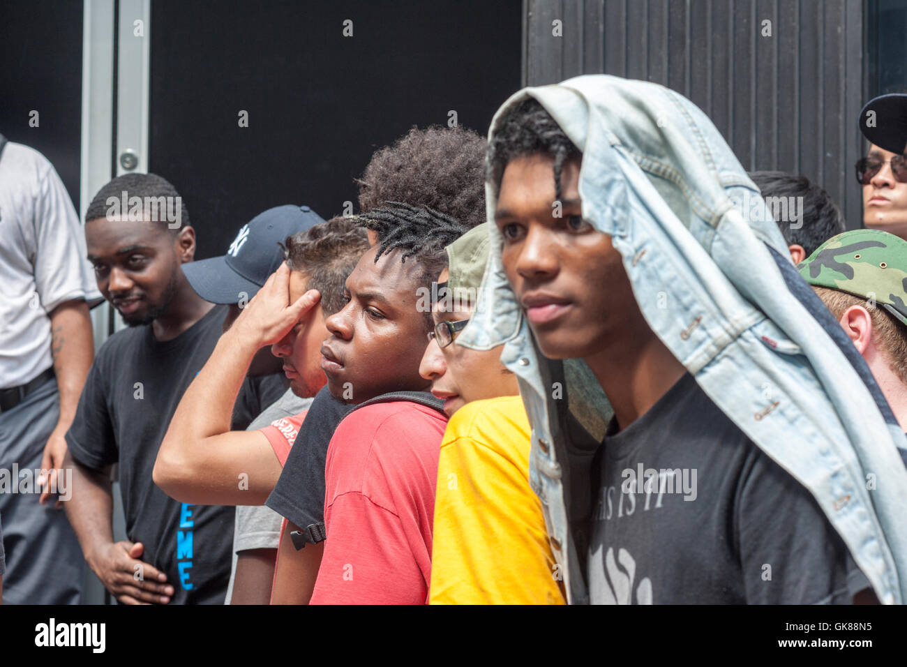 New York, USA. 19th August, 2016. Kanye West fans brave the heat and ...