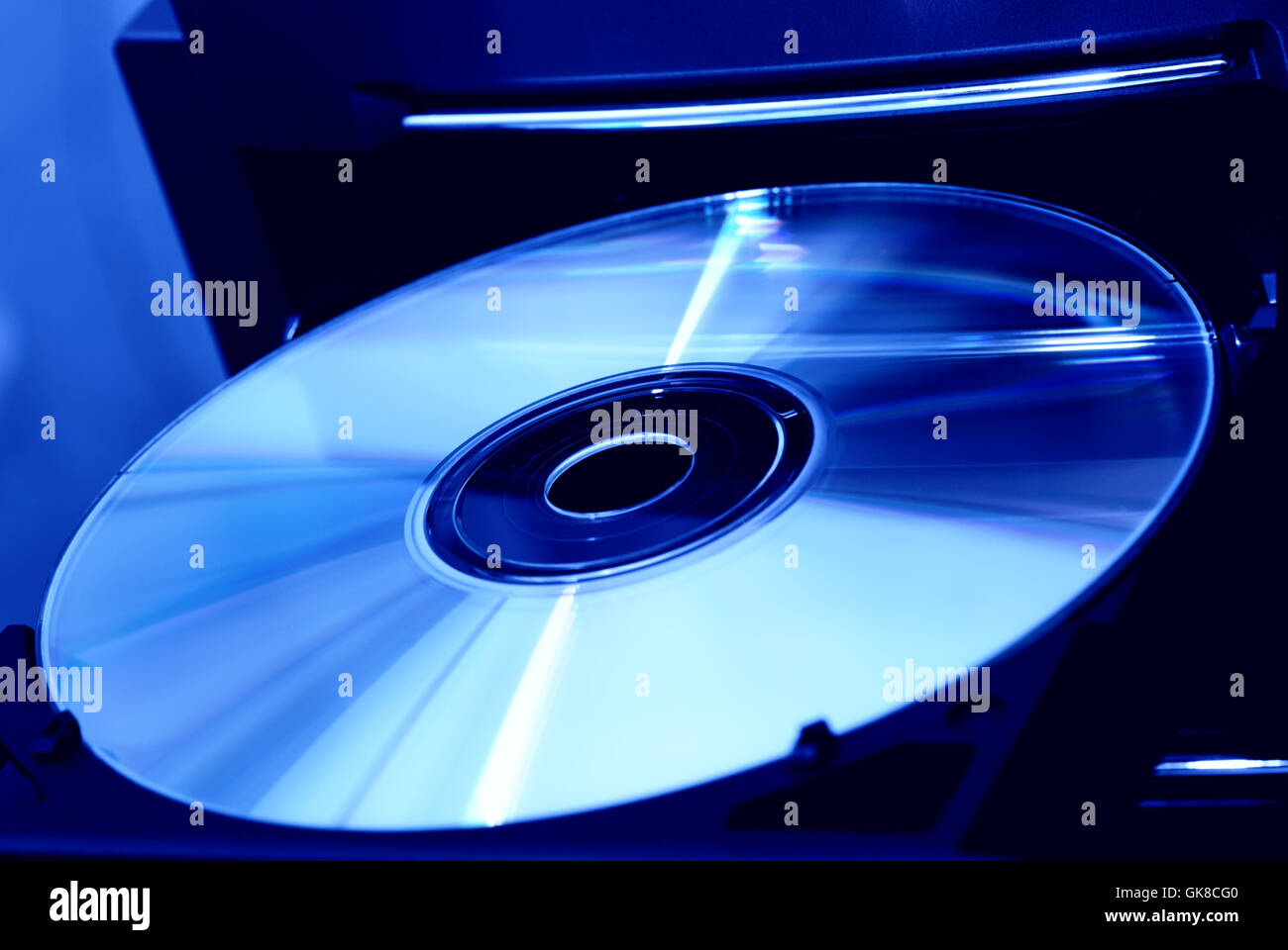 Disk in the drive Stock Photo - Alamy