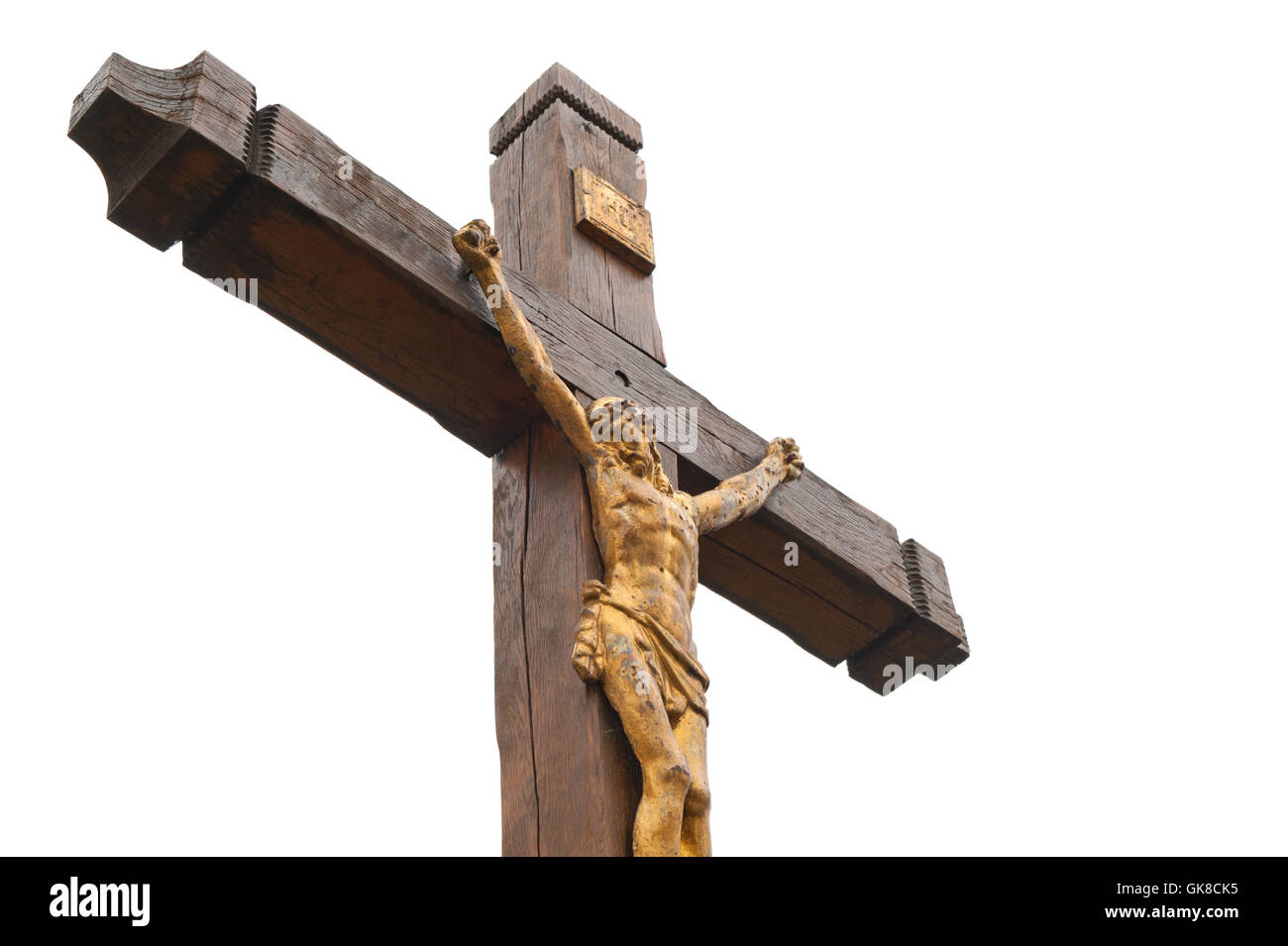 The crucifixion from a tree with Jesus's gilt figure Stock Photo - Alamy