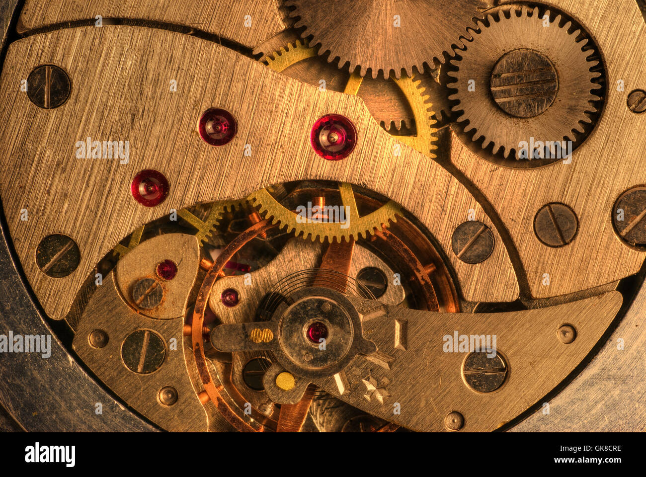 gold mechanism of analog hours Stock Photo - Alamy