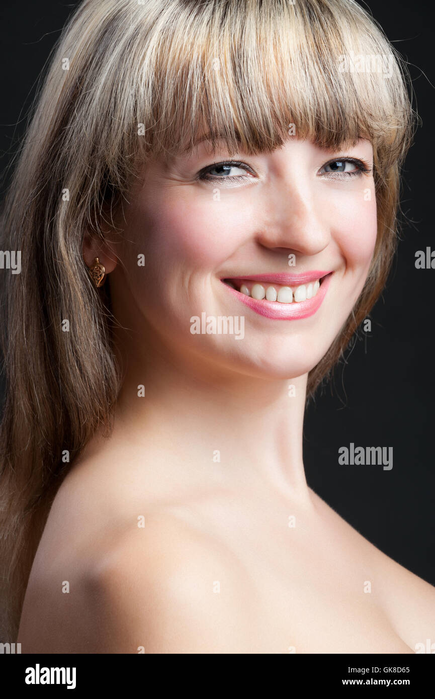 Portrait of the woman close up. The bared shoulders Stock Photo - Alamy
