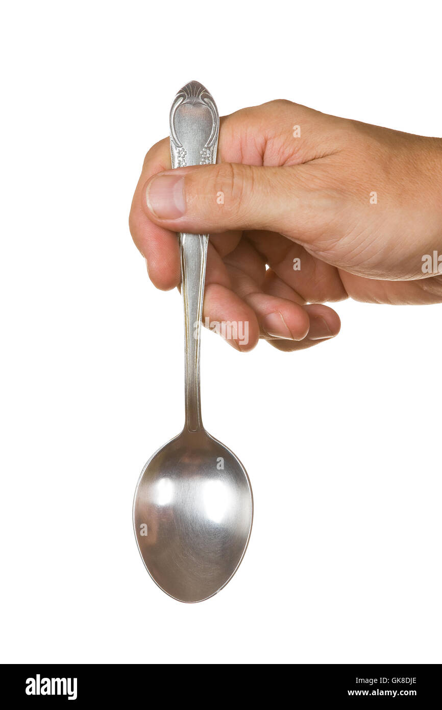 spoon in hand Stock Photo - Alamy