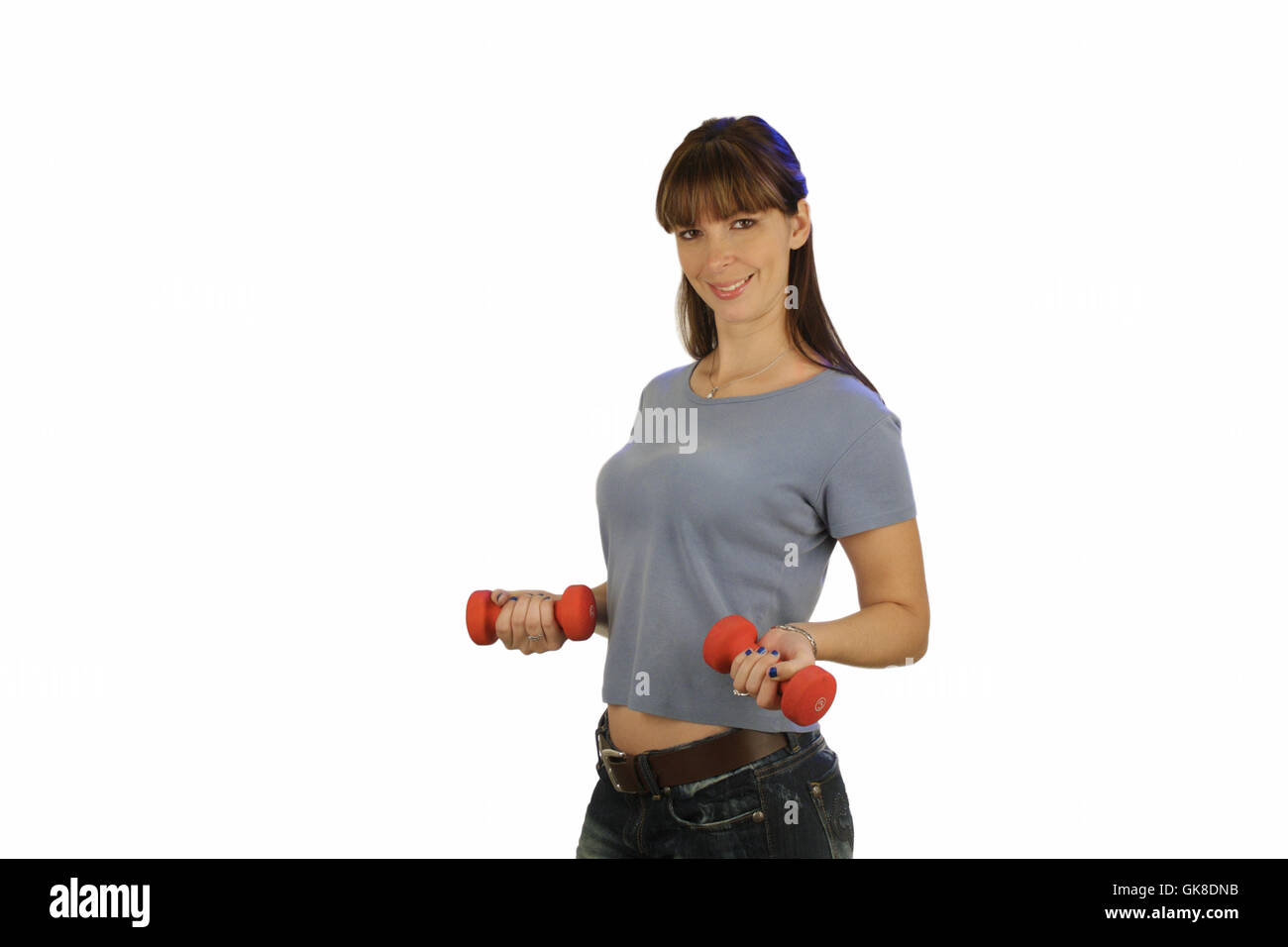 Beautiful Brunette with Hand Weights (3 Stock Photo - Alamy