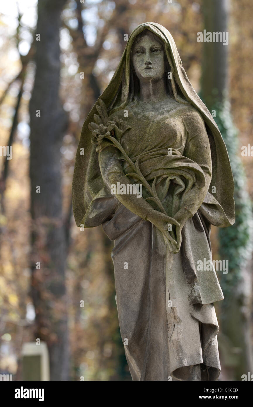 Monument Lady of Guadalupe on a cemetery Stock Photo - Alamy