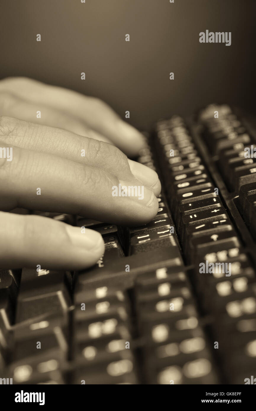 Hands above the keyboard Stock Photo - Alamy