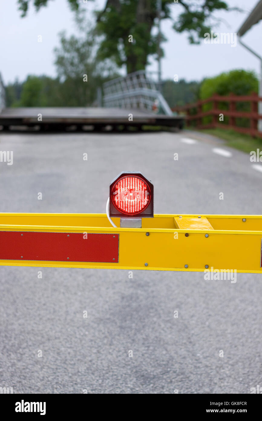 Stop light at crossing Stock Photo - Alamy