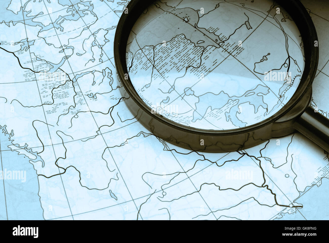 Magnifier and map Stock Photo - Alamy