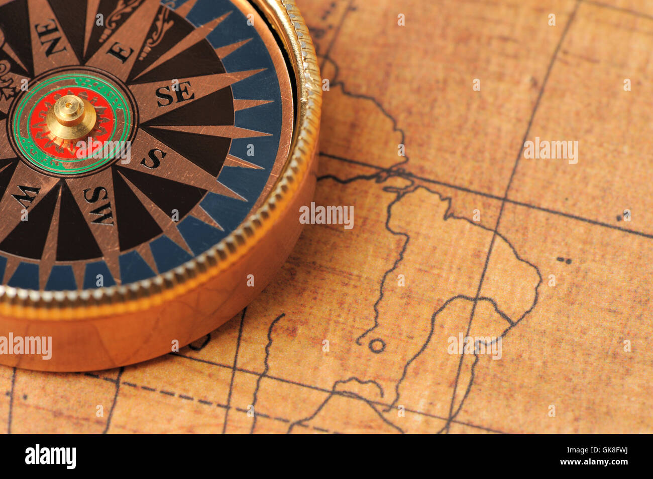 Old compass and map Stock Photo - Alamy