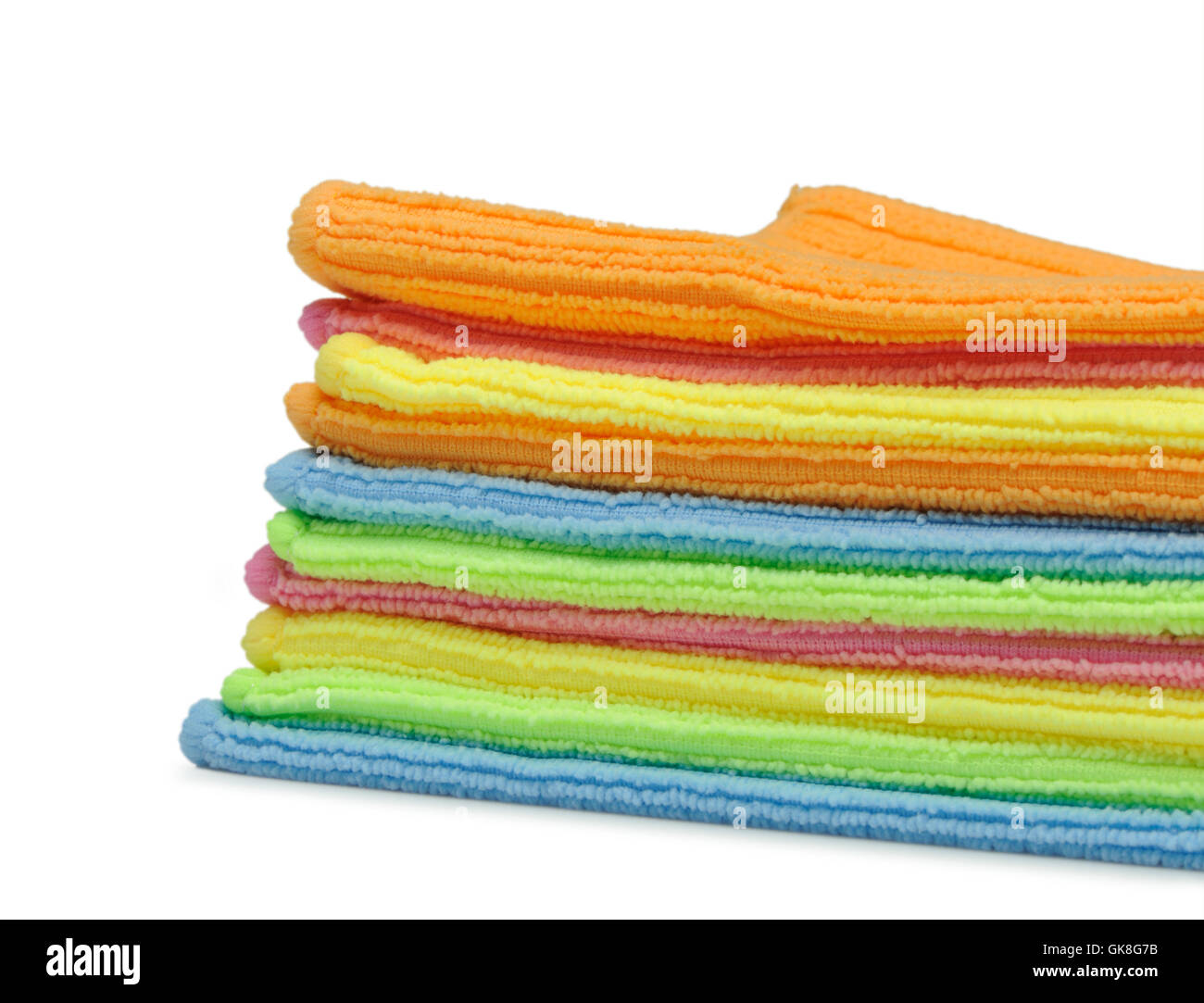 Pile double color towels Stock Photo - Alamy