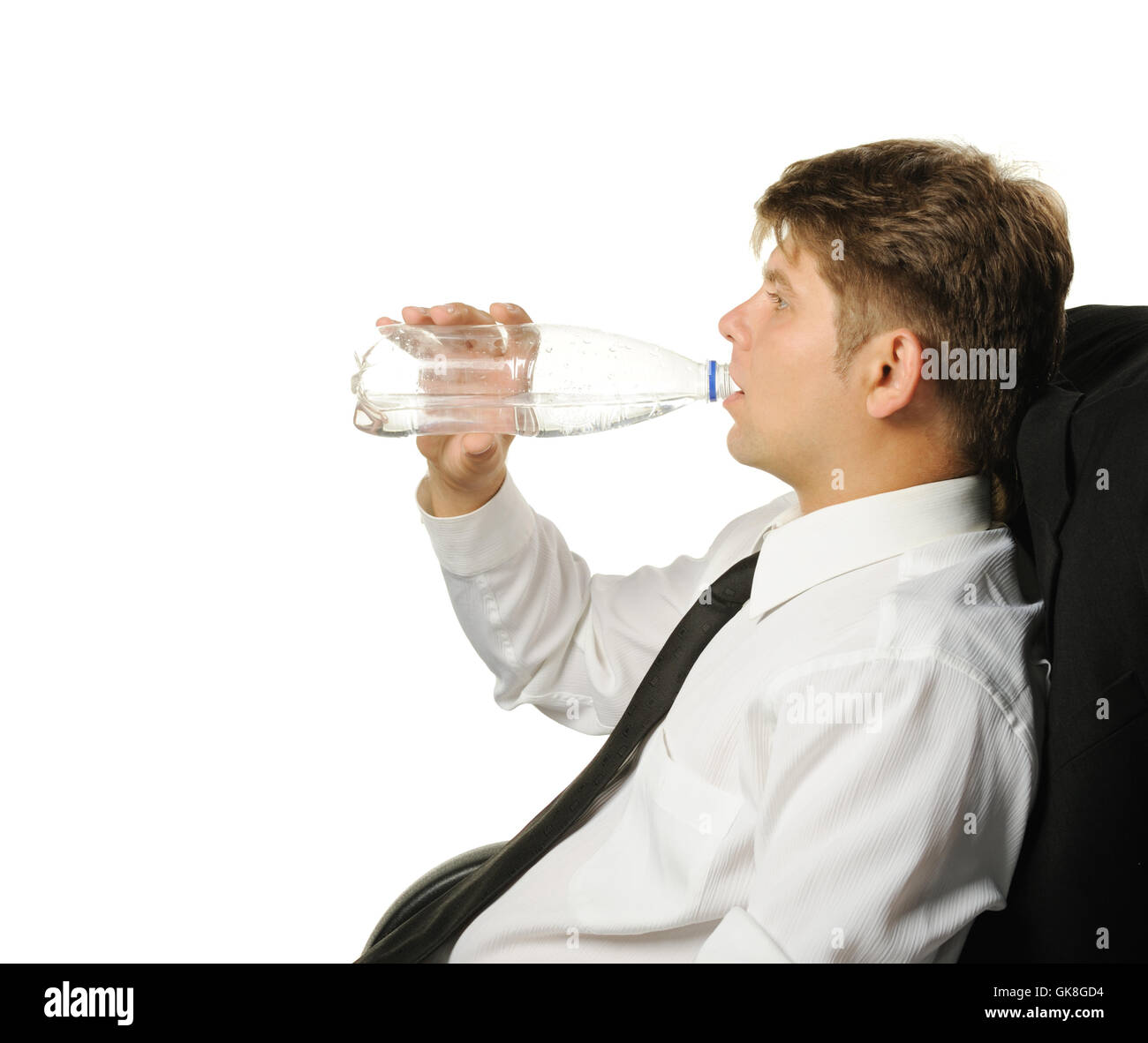 The businessman drinking water from a bottle Stock Photo - Alamy