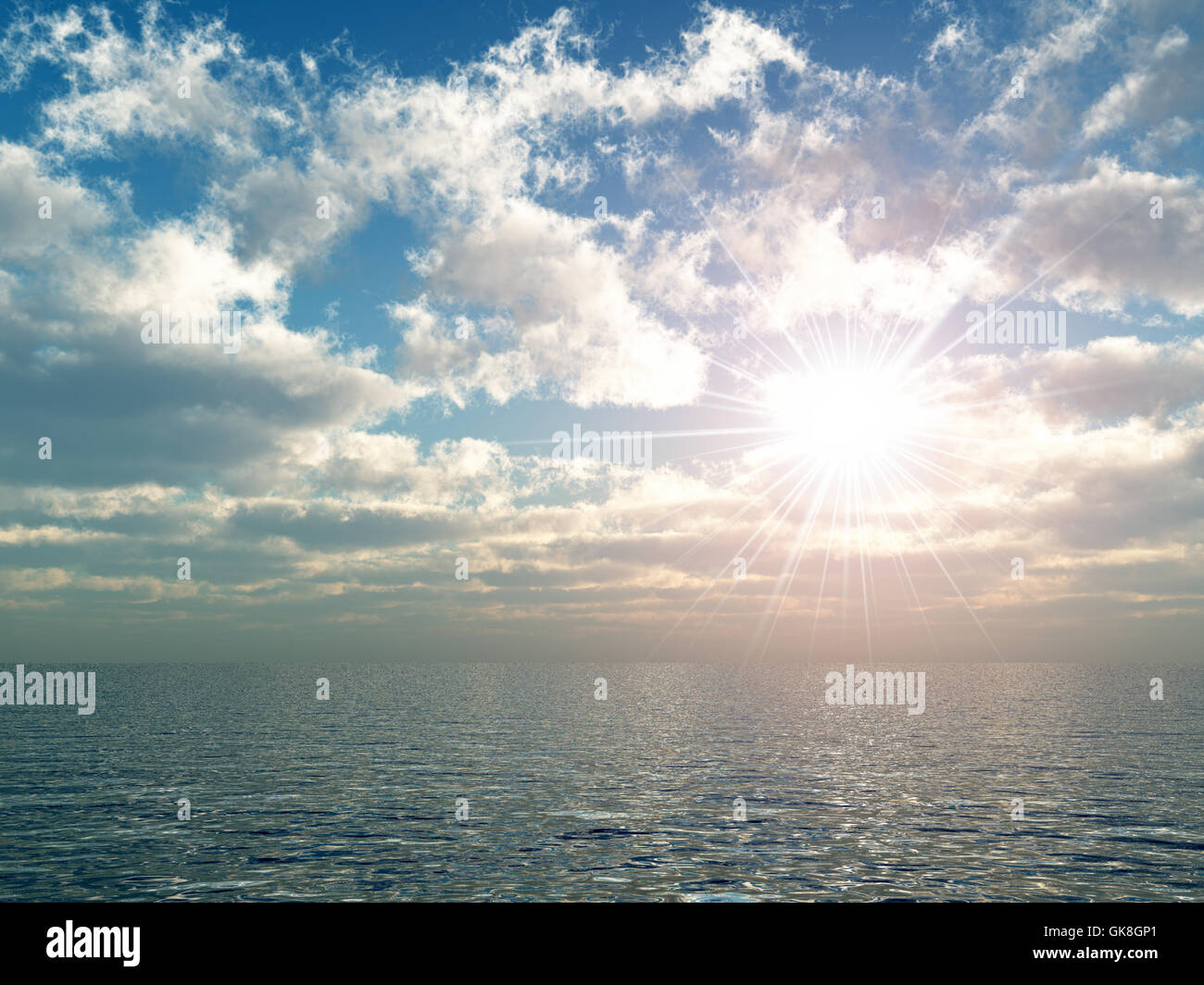 The bright sun above ocean Stock Photo - Alamy