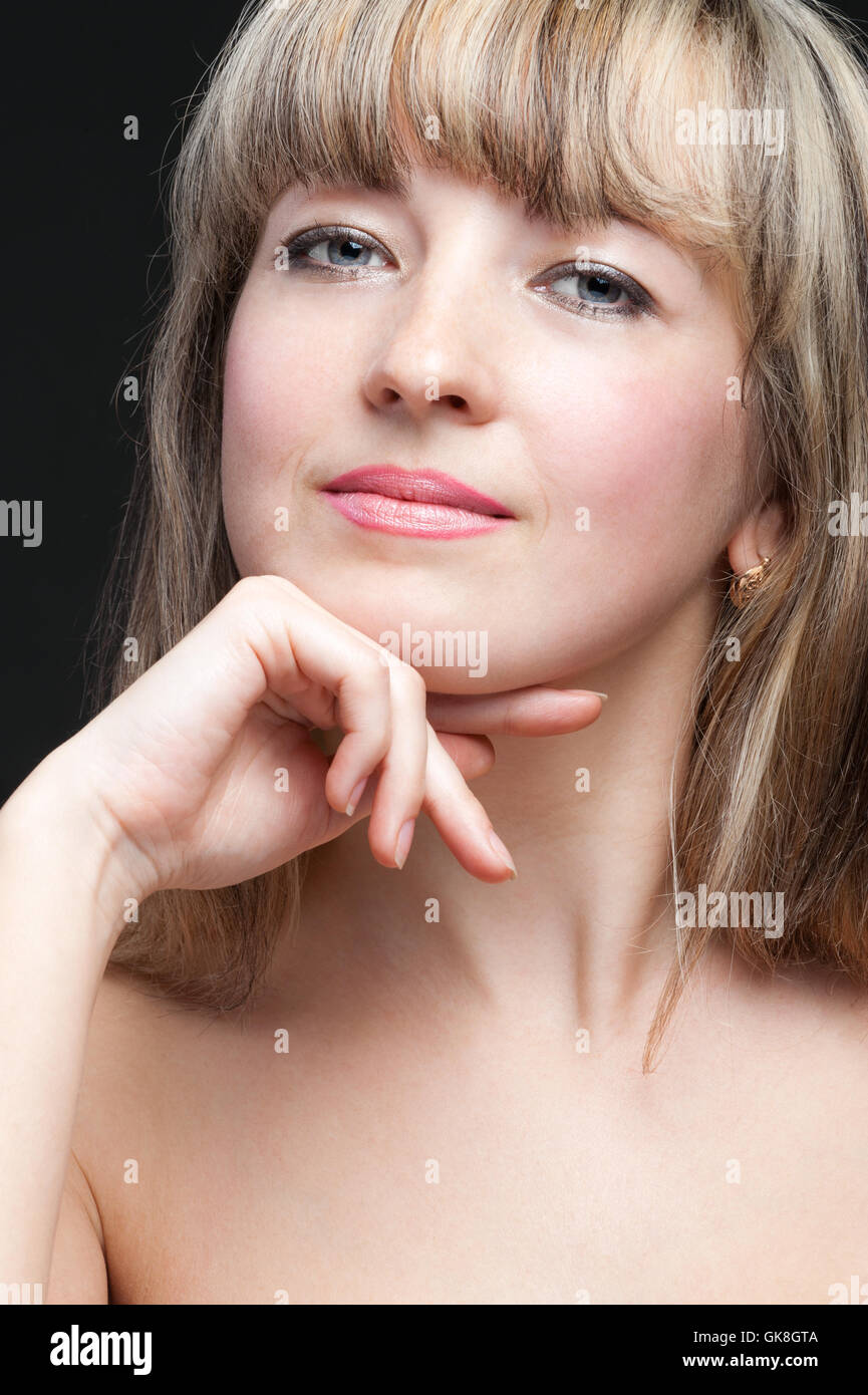 Portrait of the woman close up. The bared shoulders Stock Photo - Alamy