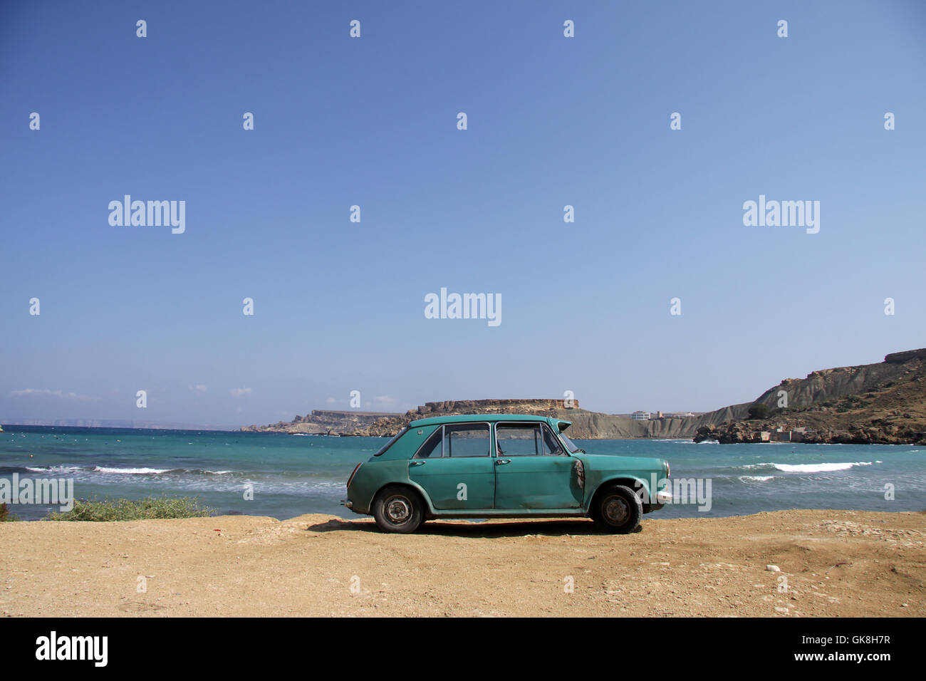 Old rusty car parked by the beach Stock Photo - Alamy