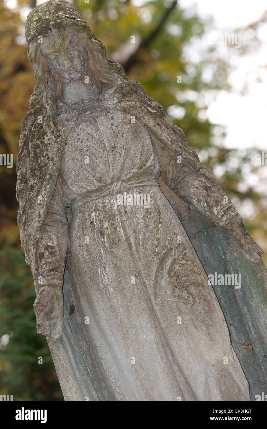 Monument Lady of Guadalupe on a cemetery Stock Photo - Alamy