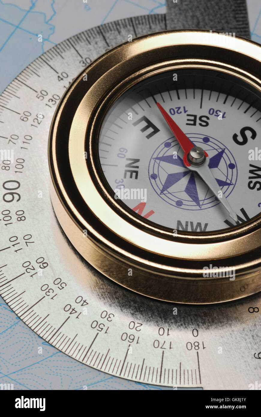 Compass and card Stock Photo - Alamy