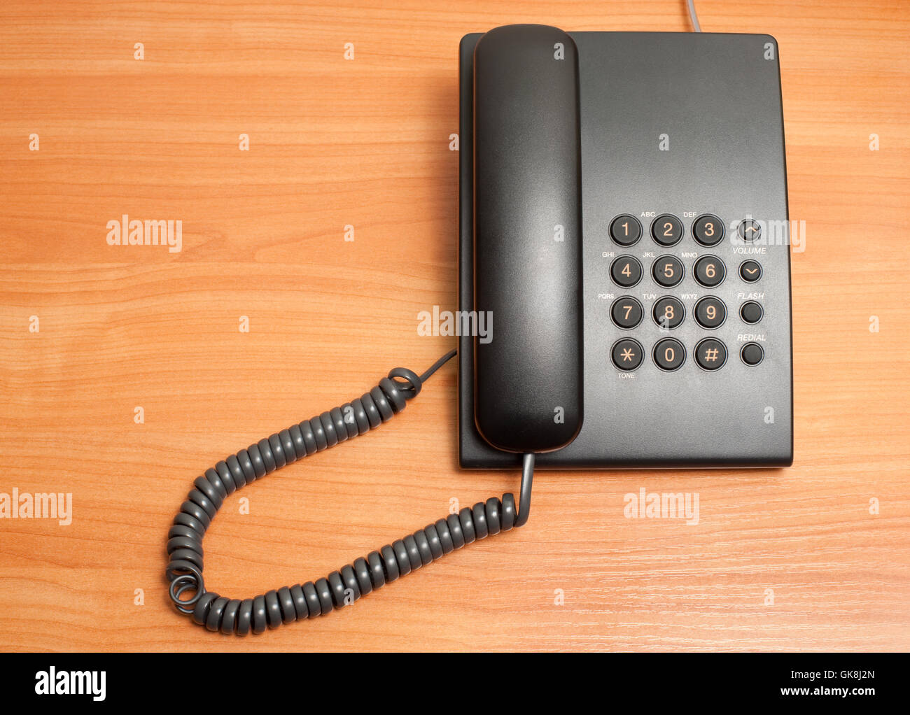 Phone on a table Stock Photo - Alamy
