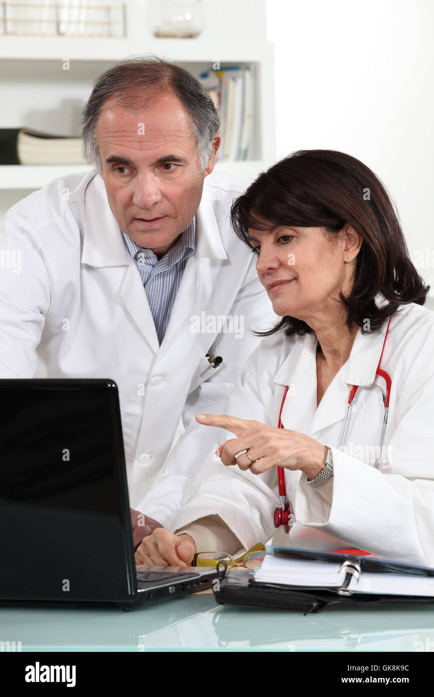 Doctor sharing results hi-res stock photography and images - Alamy